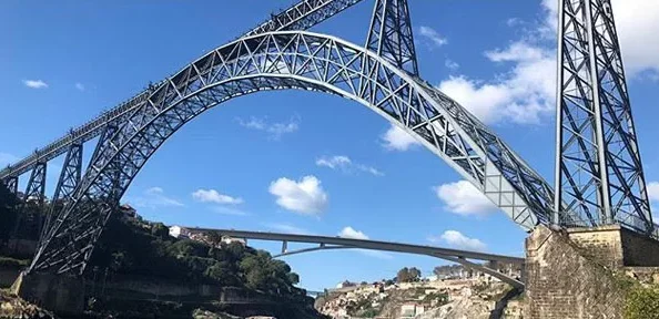 Design and material introduction of double hinged arch bridge